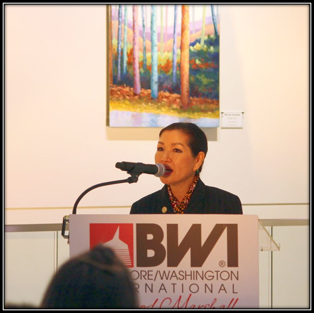Invitation to Yumi Hogan Art Gallery Dedication at BWI Marshall