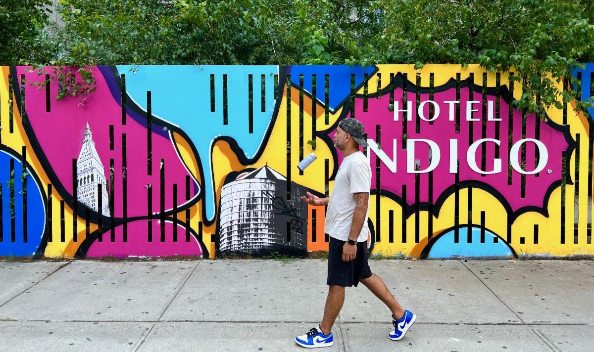 The vibrant, 170-foot-long mural facing Metropolitan Avenue features ...