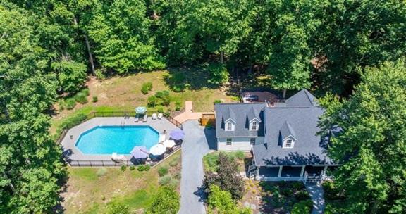 Secluded, Stylish, and Set on 3 Acres - This One Has It All
