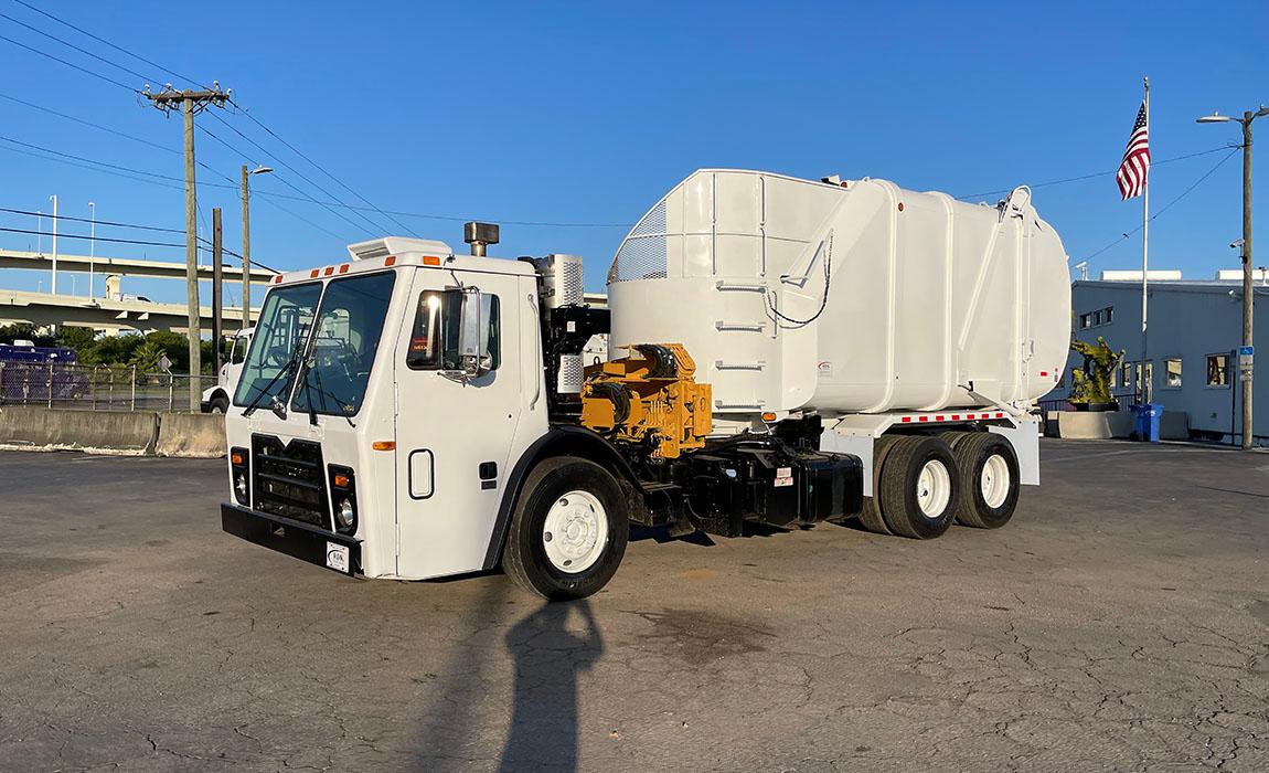 Hook Lifts and Rear Loaders! Drive one home Today!